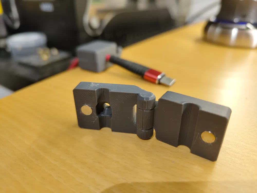 Print in place magnet locking cable organizer by Mattias - MakerWorld