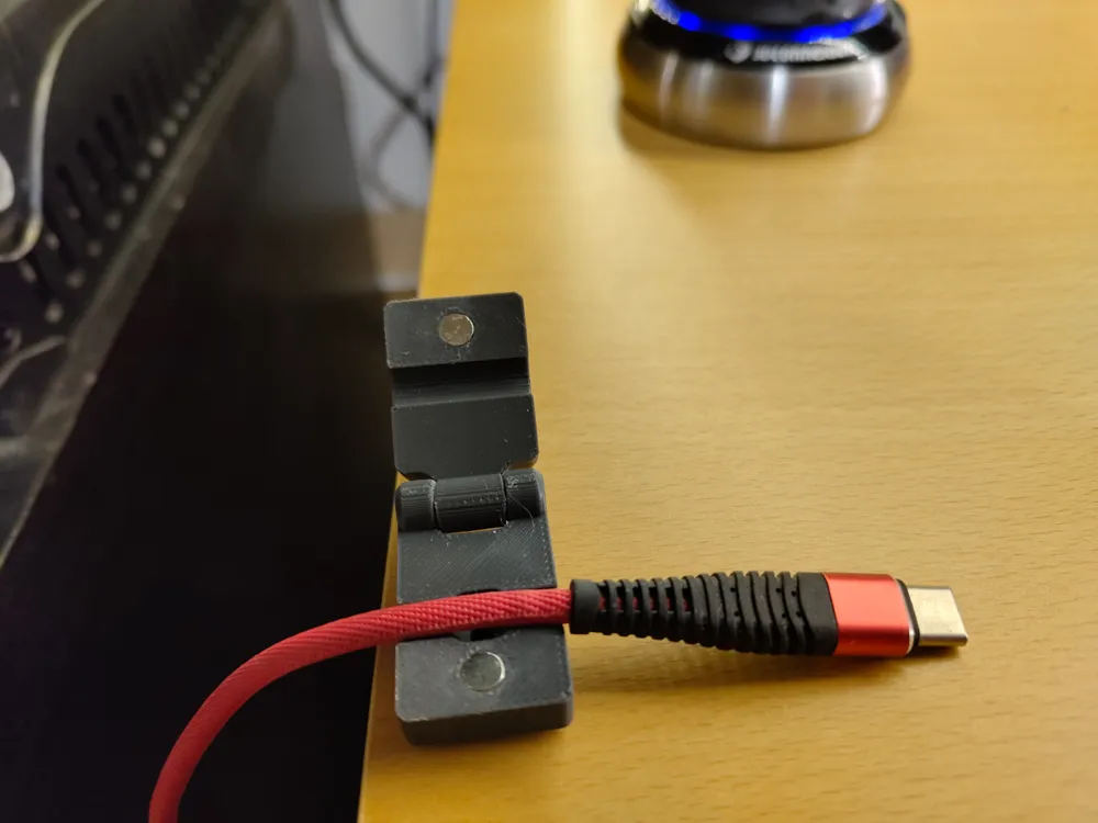 Print in place magnet locking cable organizer by Mattias - MakerWorld