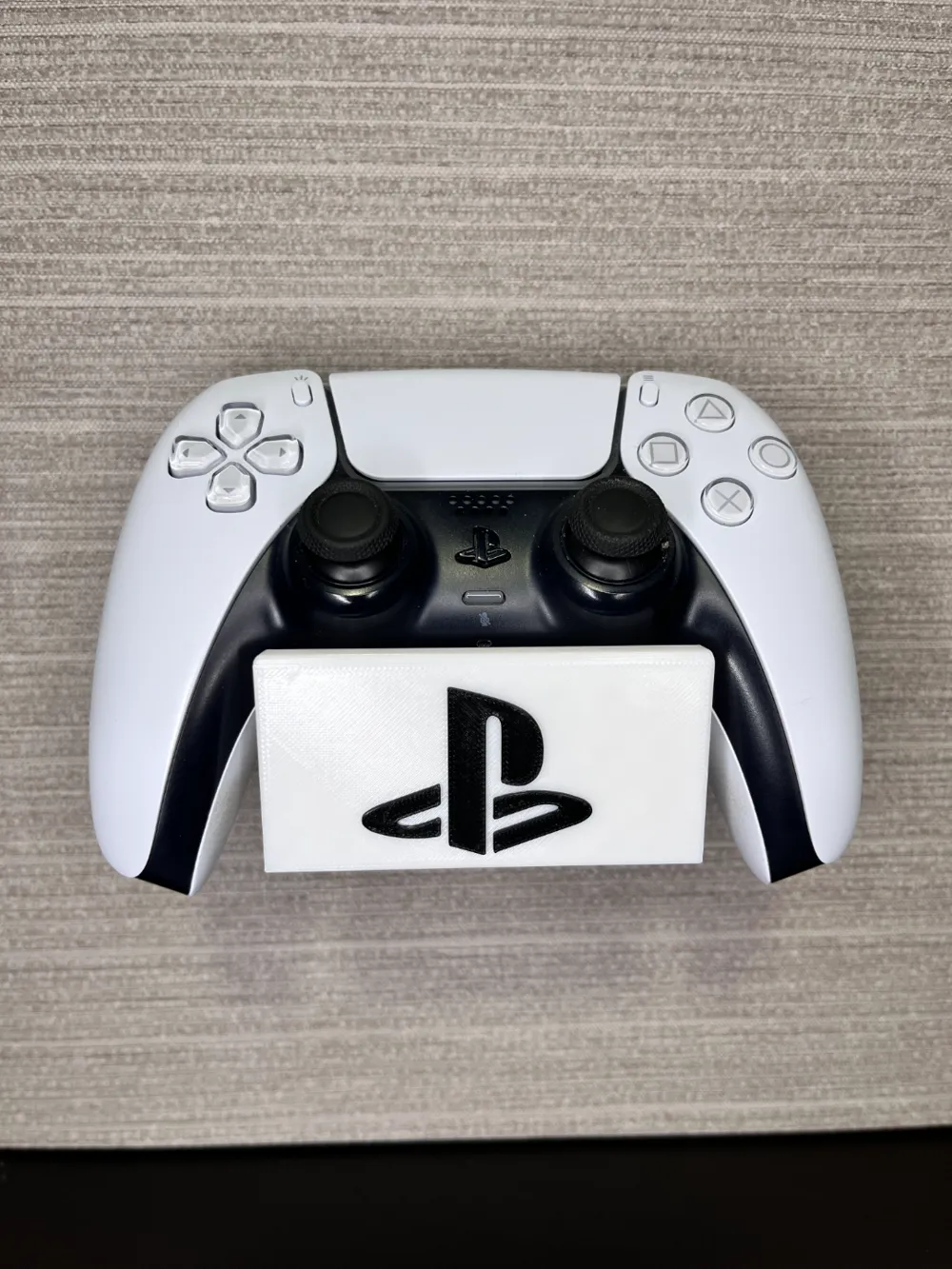 PS5 controller wall mount with logo - Free 3D Print Model - MakerWorld