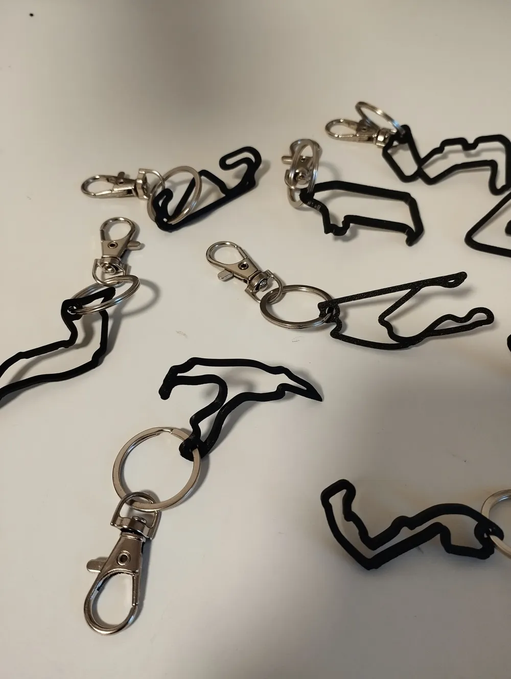 24 Formula 1 Circuit keychains - Free 3D Print Model - MakerWorld