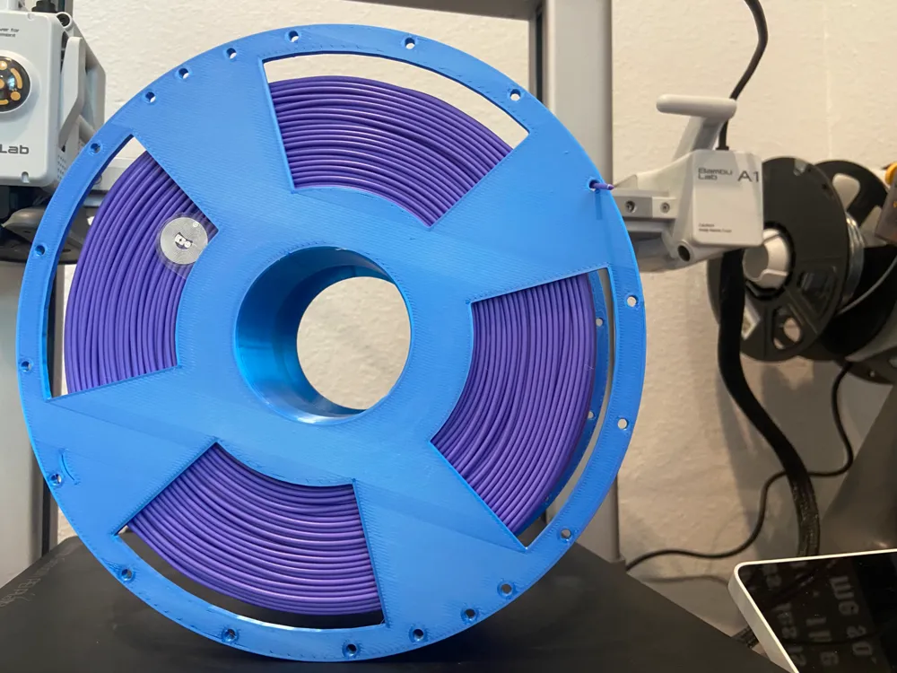 Bambu Lab Reusable Spool Remixed by Creative User - MakerWorld