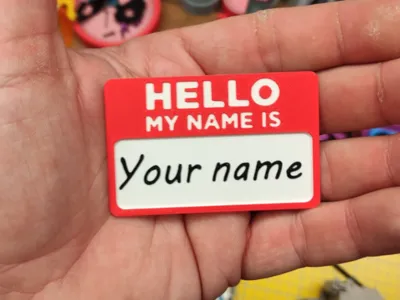 "HELLO, my name is" nametag by Matej's WorkshopMakerWorld: Download ...
