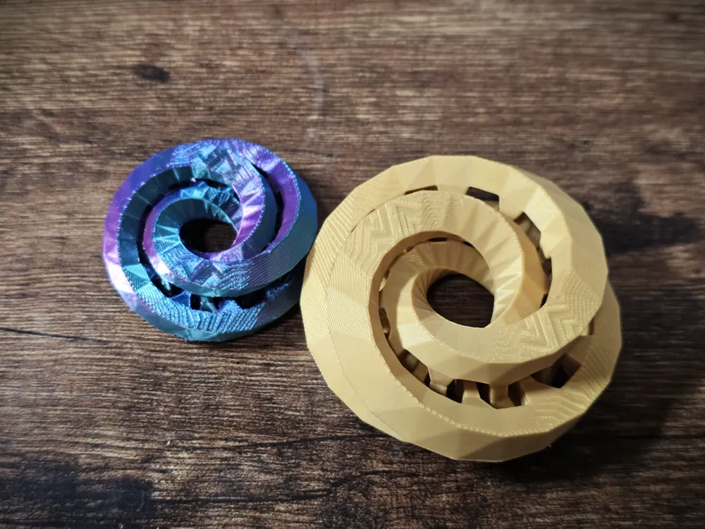 Interlocked mobius bands by Ellipse - MakerWorld