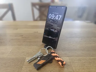 FOLDABLE KEY PHONE STAND WITH WHISTLE - Free 3D Print Model - MakerWorld