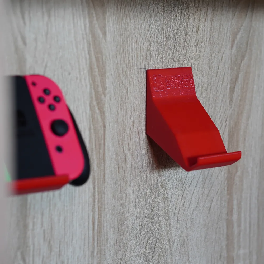 Nintendo Switch JOYCon-Grip Holder by techam - MakerWorld