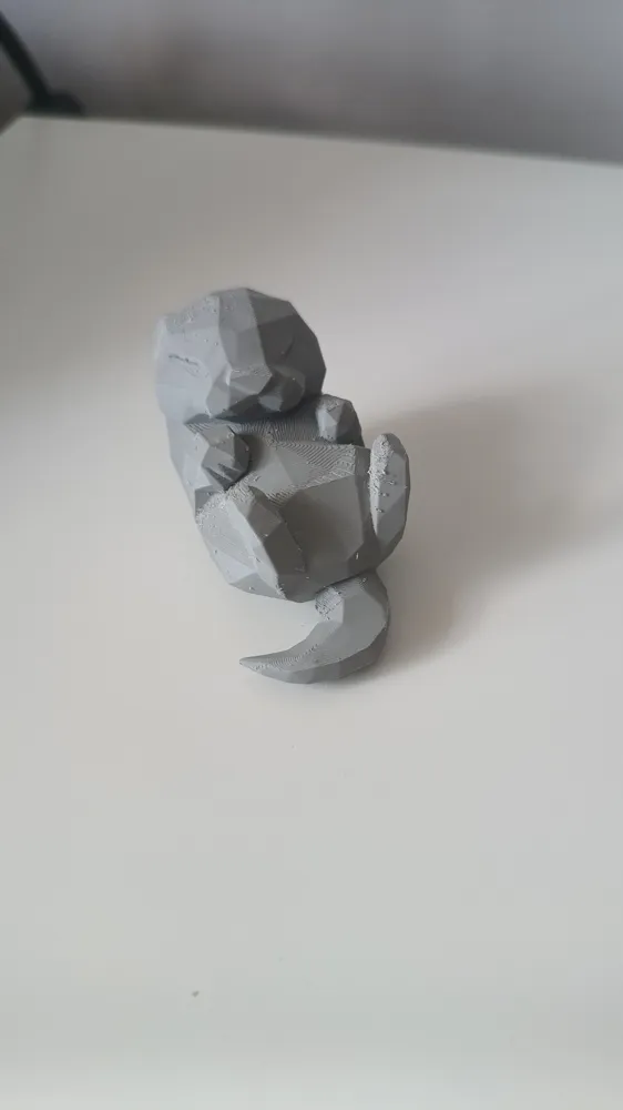Low Poly Sleeping Otter Figurine - Free 3D Print Model - MakerWorld