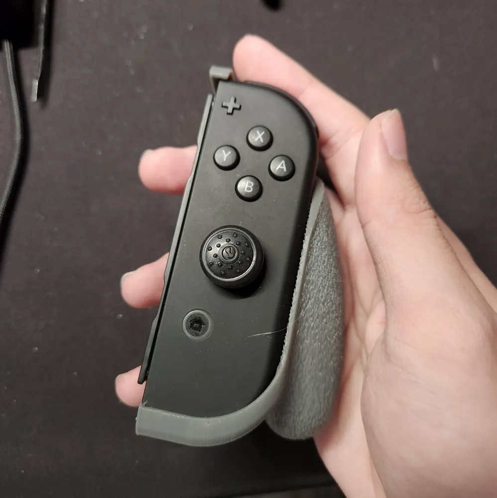 Switch Joycon Grips Remixed by rbel MakerWorld: Download Free 3D Models