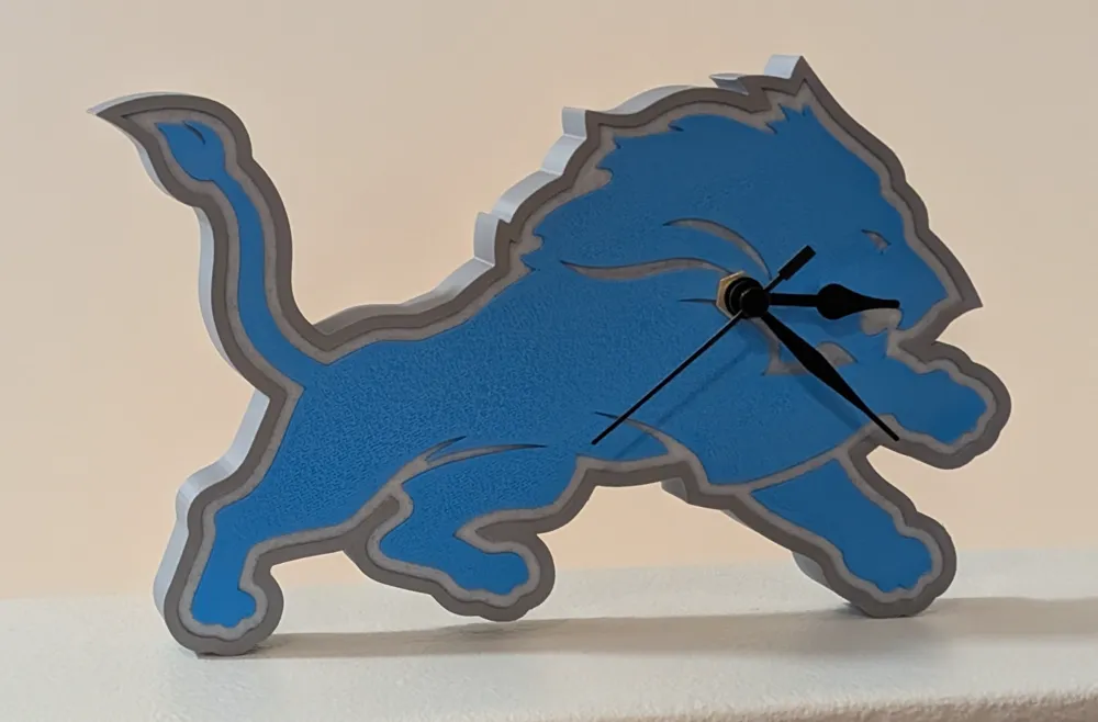 Detroit Lions Football Wall Clock by thebadastronaut - MakerWorld