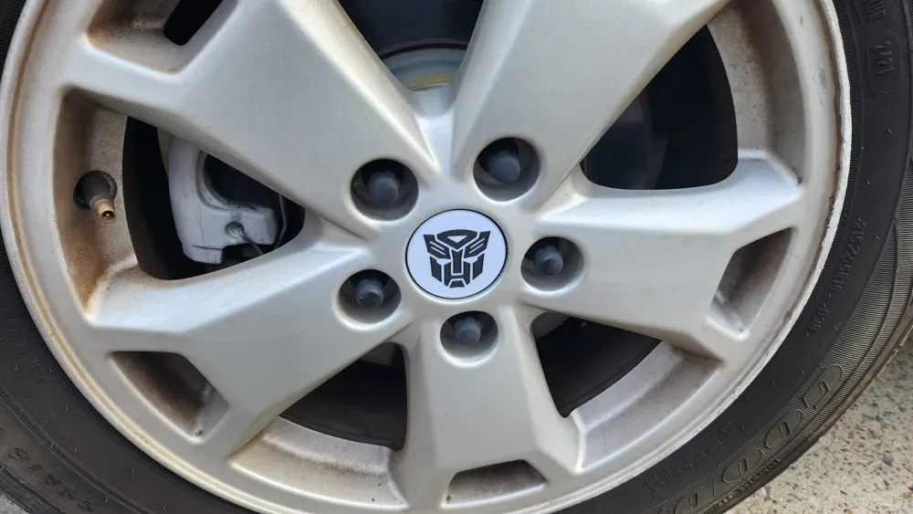 Ford Wheel Cap (Autobot Logo) by geekm0nkey - MakerWorld