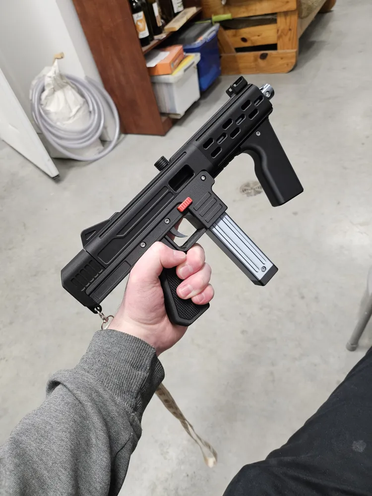 SPCTRM SMG-10: Shell-Ejecting Toy Blaster - Free 3D Print Model ...