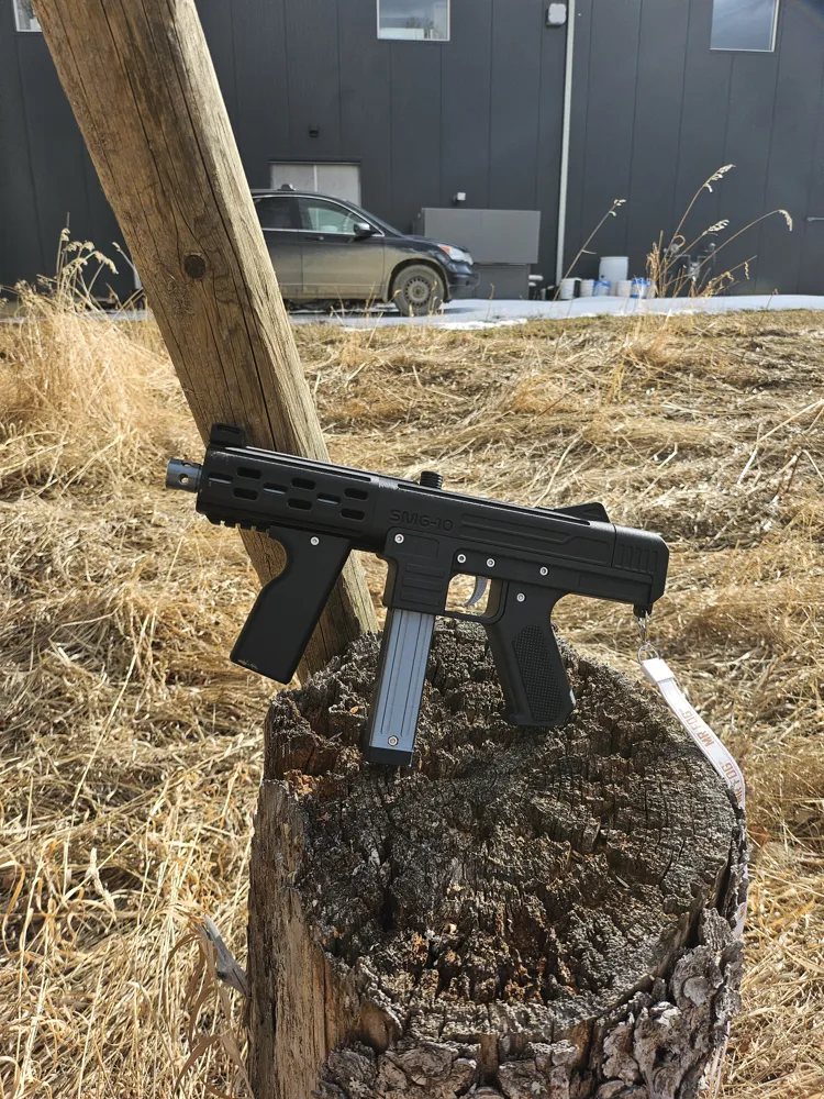 SPCTRM SMG-10：弹壳弹出式玩具发射器 - 免费 3D 打印模型 - MakerWorld