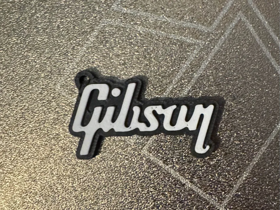 Gibson keychain by Pochekana MakerWorld: Download Free 3D Models