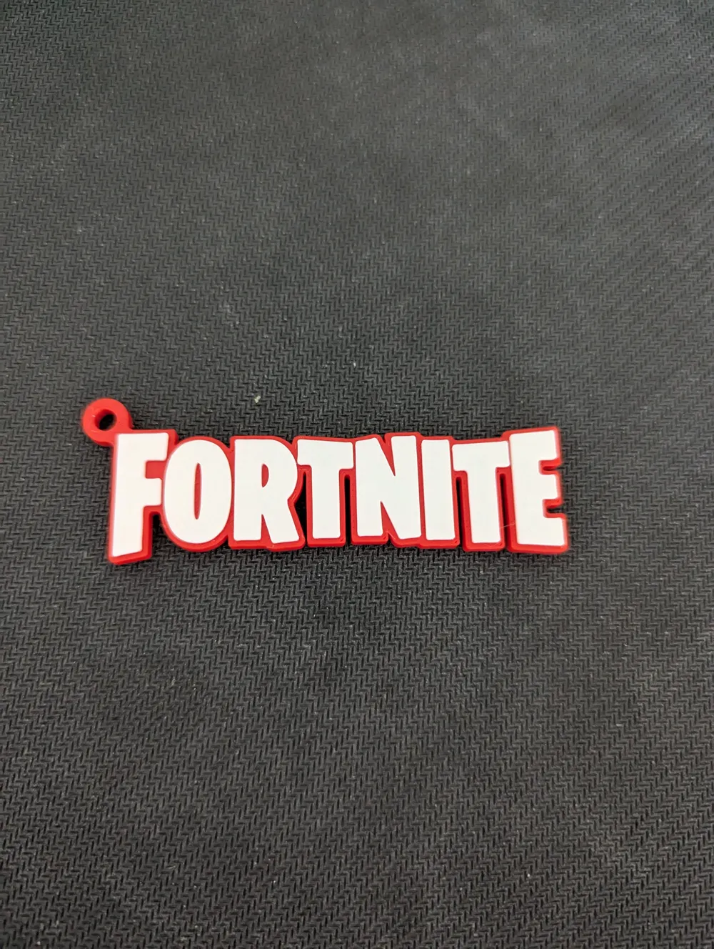 Fortnite logo keychain by Dava MakerWorld: Download Free 3D Models