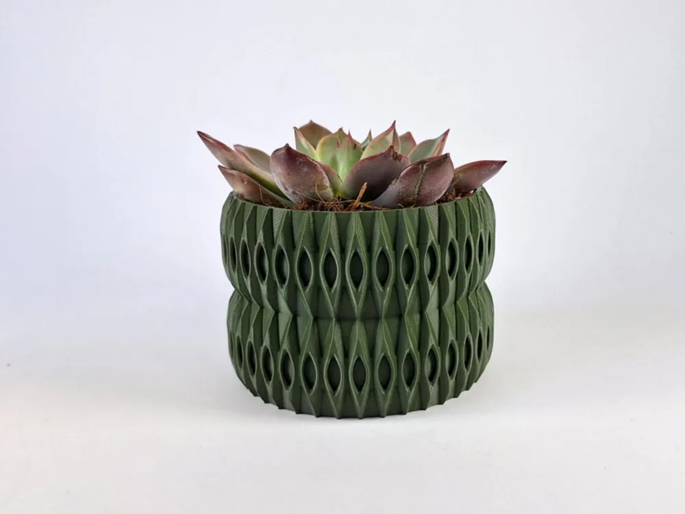 Stylish 3D-Printed Plant Pot - Free 3D Print Model - MakerWorld