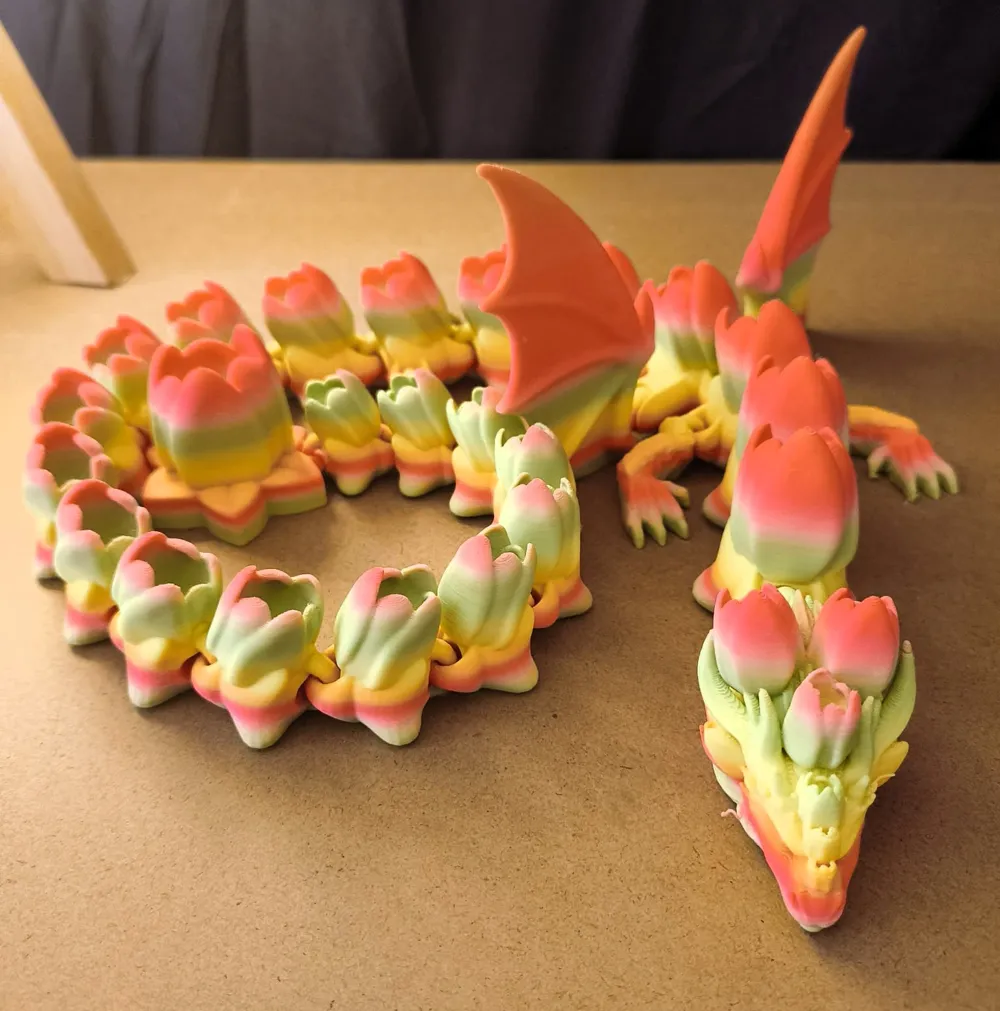 Articulated flexi dragon Tulips - Free 3D Print Model - MakerWorld