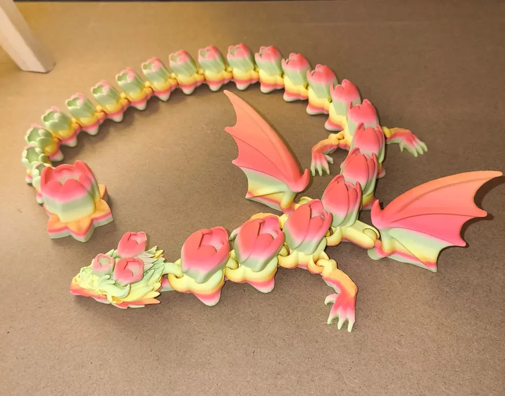 Articulated flexi dragon Tulips - Free 3D Print Model - MakerWorld