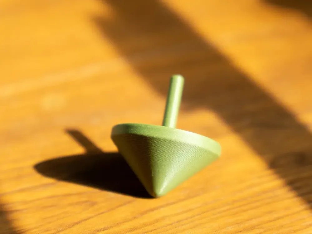 Small spinning top (rotation > 1 minute) by Fun3D Print - MakerWorld