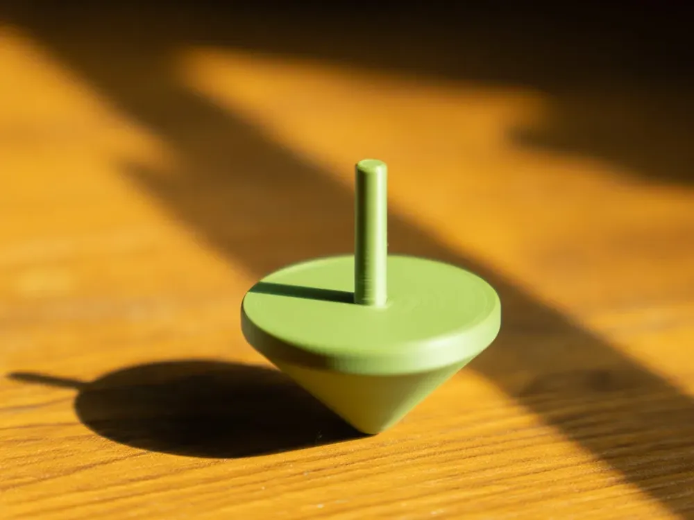 Small spinning top (rotation > 1 minute) by Fun3D Print - MakerWorld