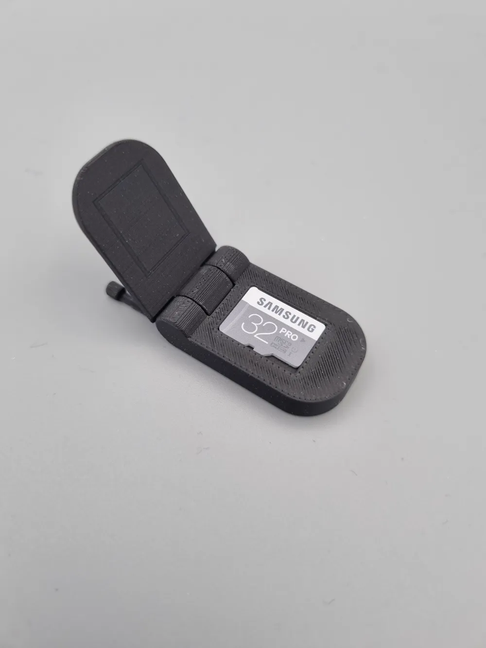 Zoolander phone sdcard holder by christofer.jh - MakerWorld