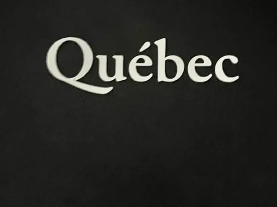 Quebec Government Logo Liberal MPs' Offices Stand By 'Partisan'