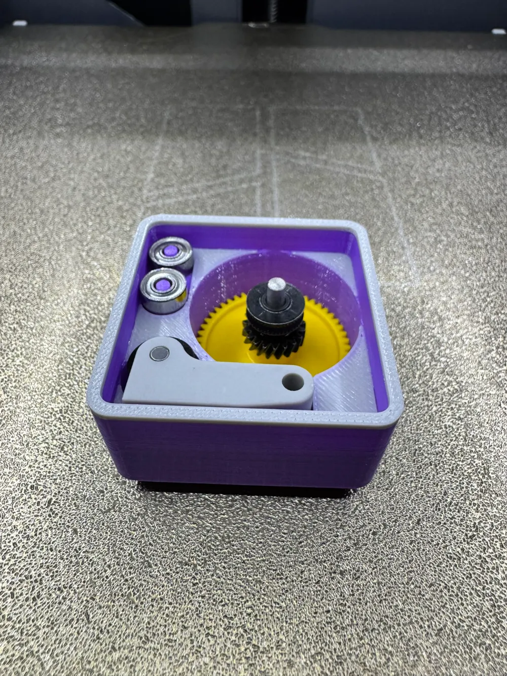 Extruder Gear Gridfinity Box - fits AMS Riser by Redbluefire - MakerWorld