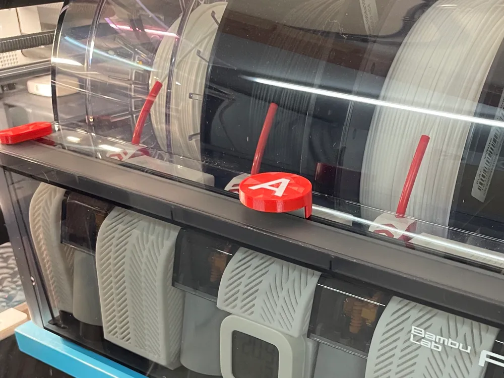 Bambu Lab AMS Caps by Print in 3D - MakerWorld