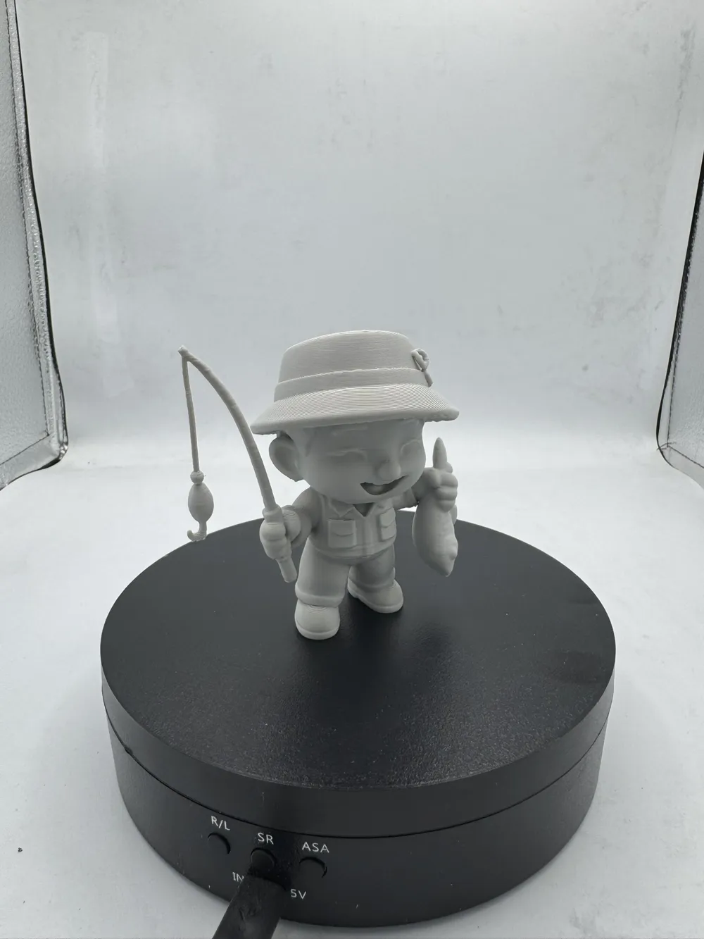 Cute Chibi Fisherman holding a fish - Free 3D Print Model - MakerWorld