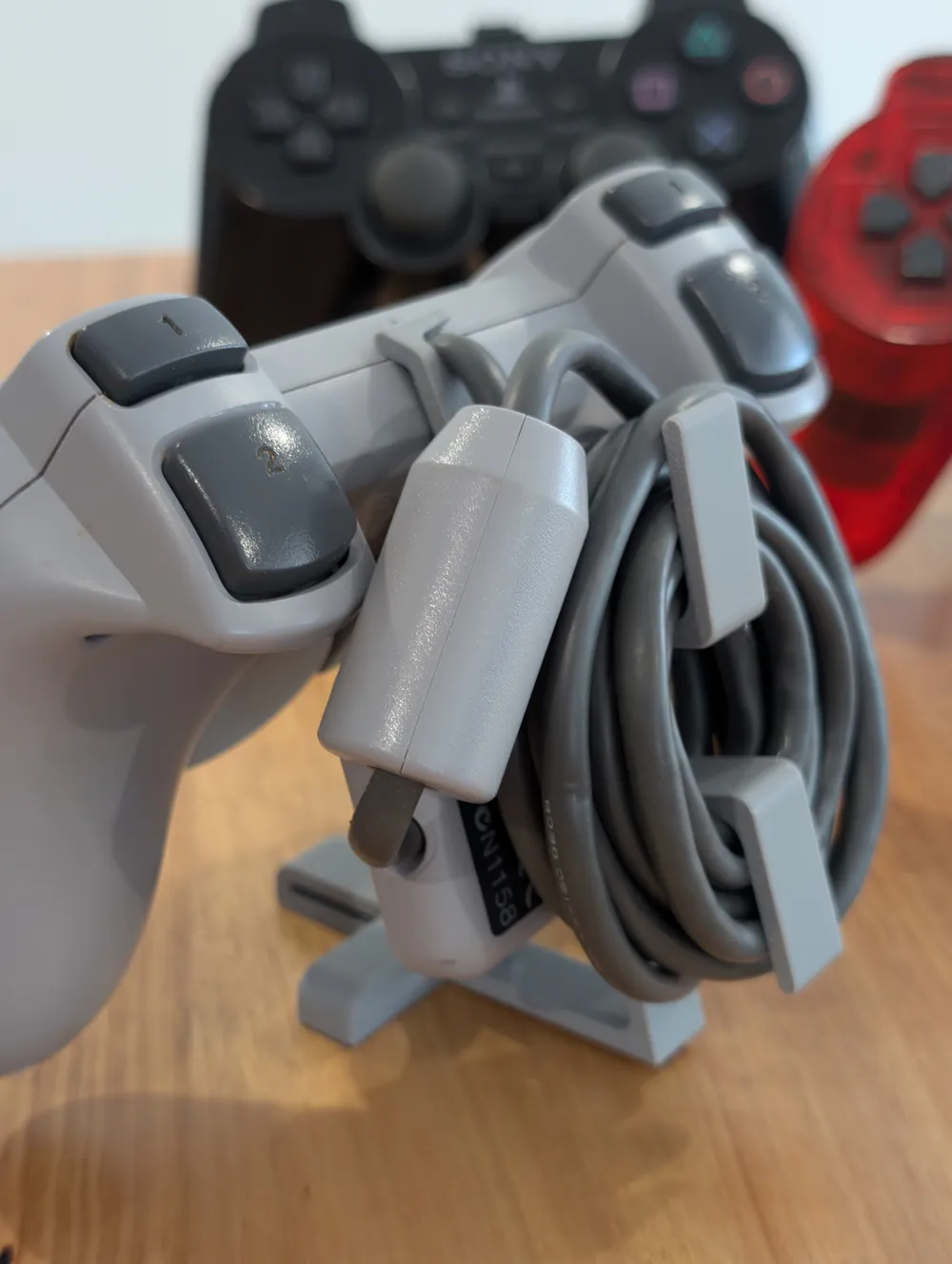 PlayStation Dual Shock 1 and 2 Controller Display - Free 3D Print Model ...