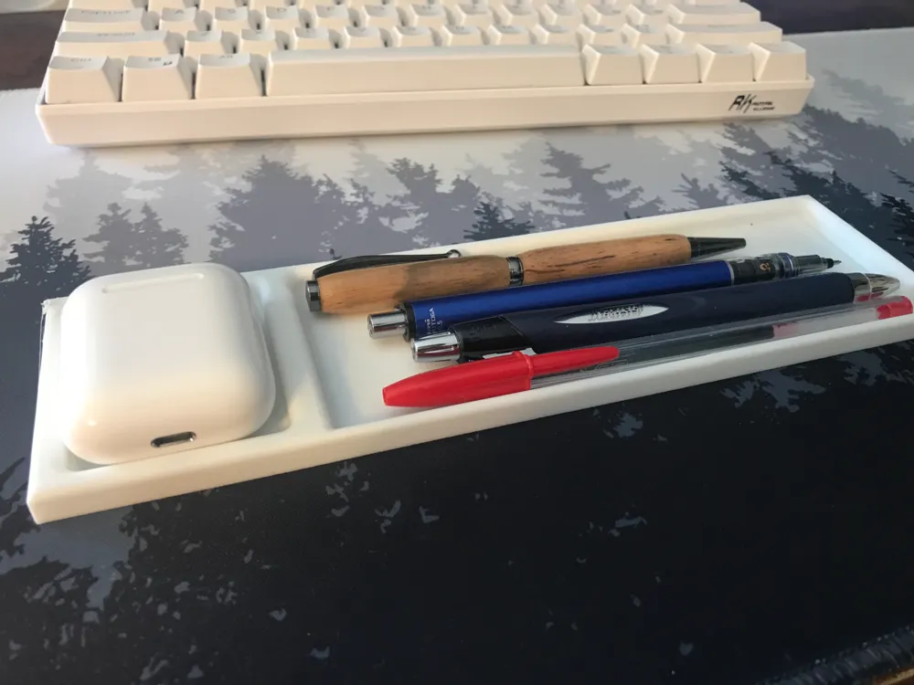 AirPod and pen holder desk accessory by PrintedByJohn - MakerWorld