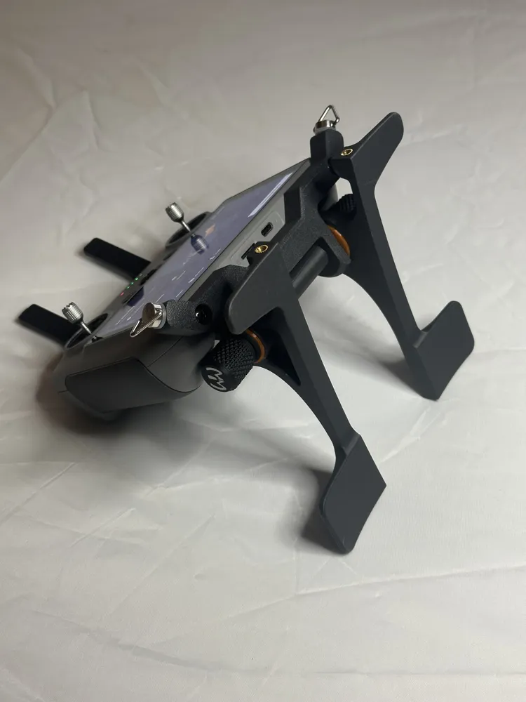 ergonomic DJI RC2 Neck Strap Base / Stand by Made.In.MeidlingMakerWorld ...