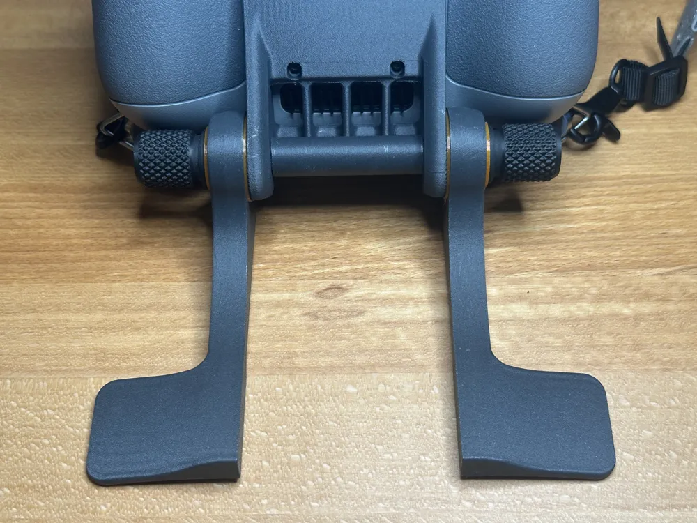 ergonomic DJI RC2 Neck Strap Base / Stand by Made.In.MeidlingMakerWorld ...