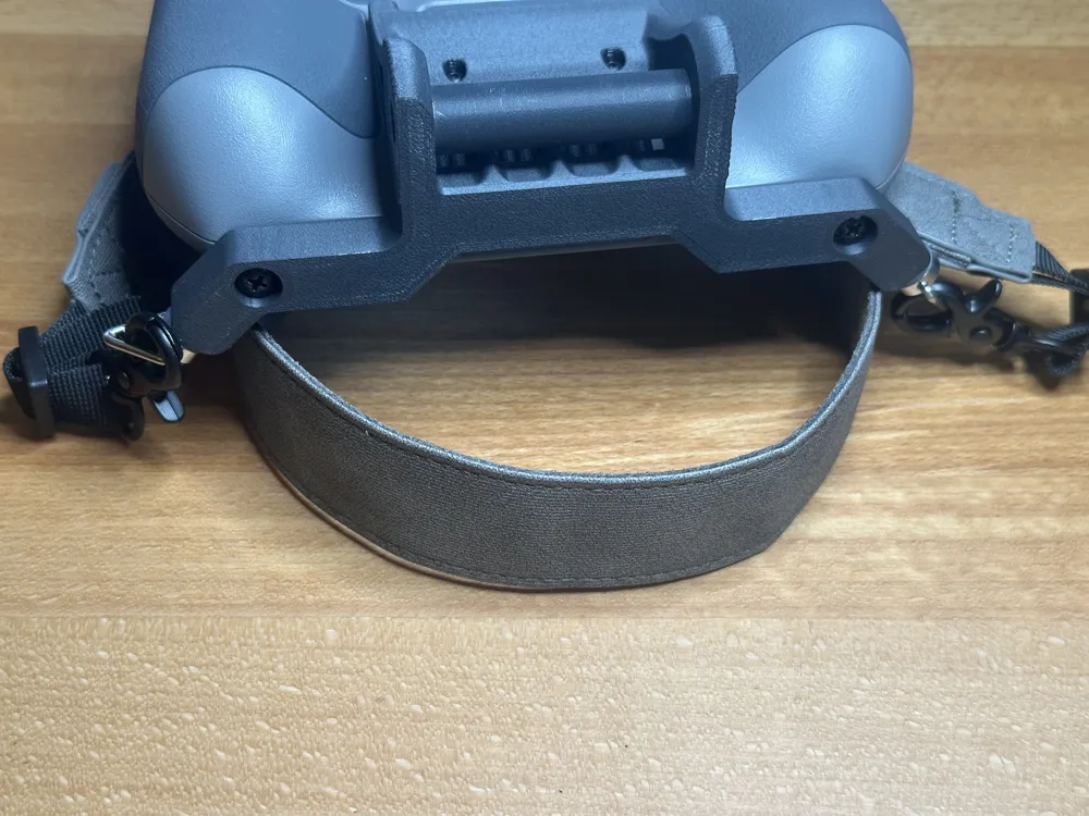 ergonomic DJI RC2 Neck Strap Base / Stand by Made.In.MeidlingMakerWorld ...