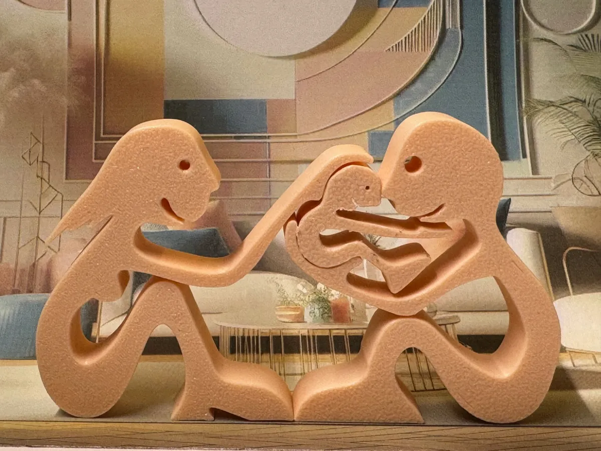 Happy Family (woman and a man holding a baby) by Keyline Studio MakerWorld: Download Free 3D Models