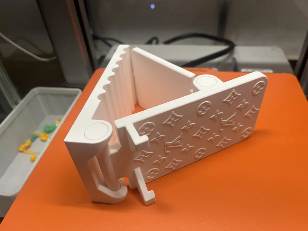 LV Phone Stand (Print in Place) V2.0 - Free 3D Print Model - MakerWorld