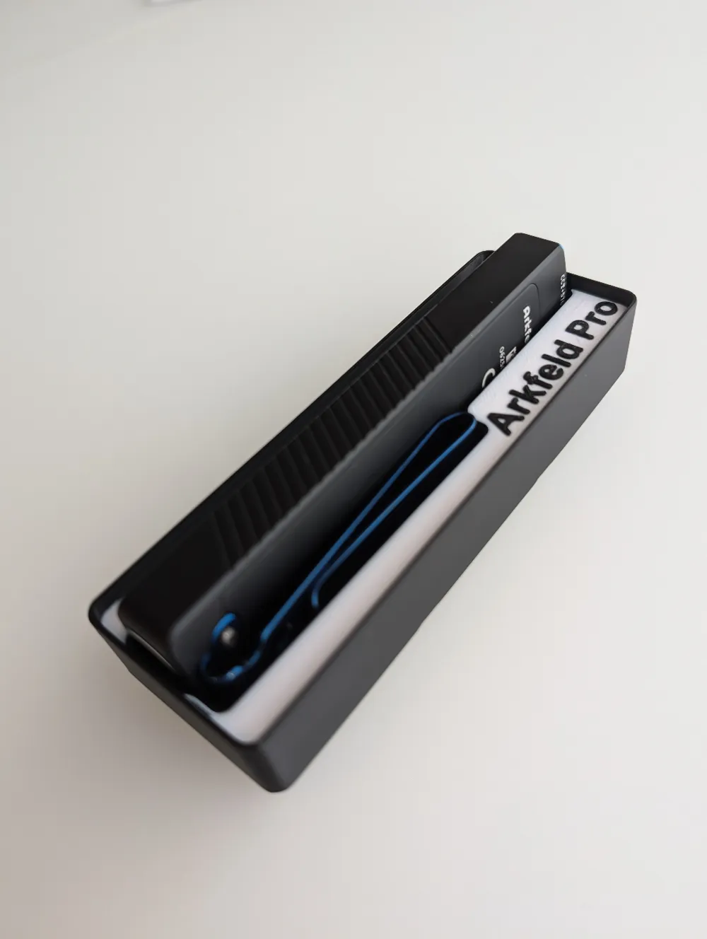 Olight Arkfeld Pro Gridfinity holder 3x1 by Jooa97 - MakerWorld