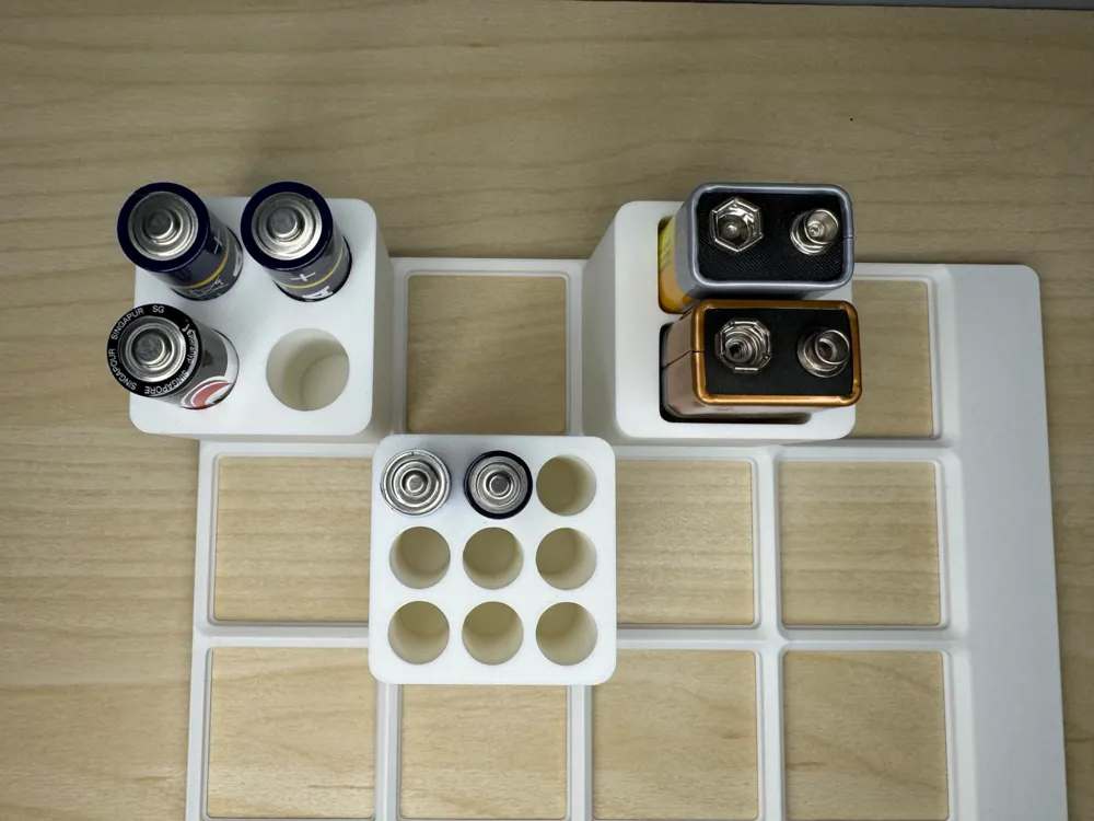 Gridfinity Battery Holder (AA/AAA/9V) by Lukas MakerWorld: Download Free 3D Models