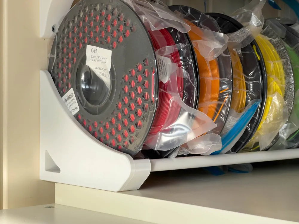 Wall mounted filament spool holder - Free 3D Print Model - MakerWorld