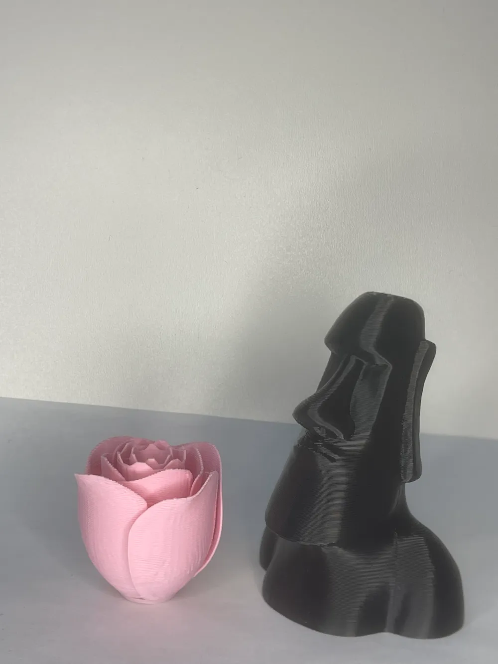 moai stone statue and a rose by Tazman - MakerWorld