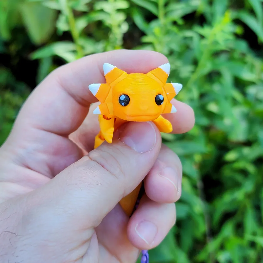 Candy Corn Axolotl Flexi by Cosmo Moore MakerWorld: Download Free 3D Models
