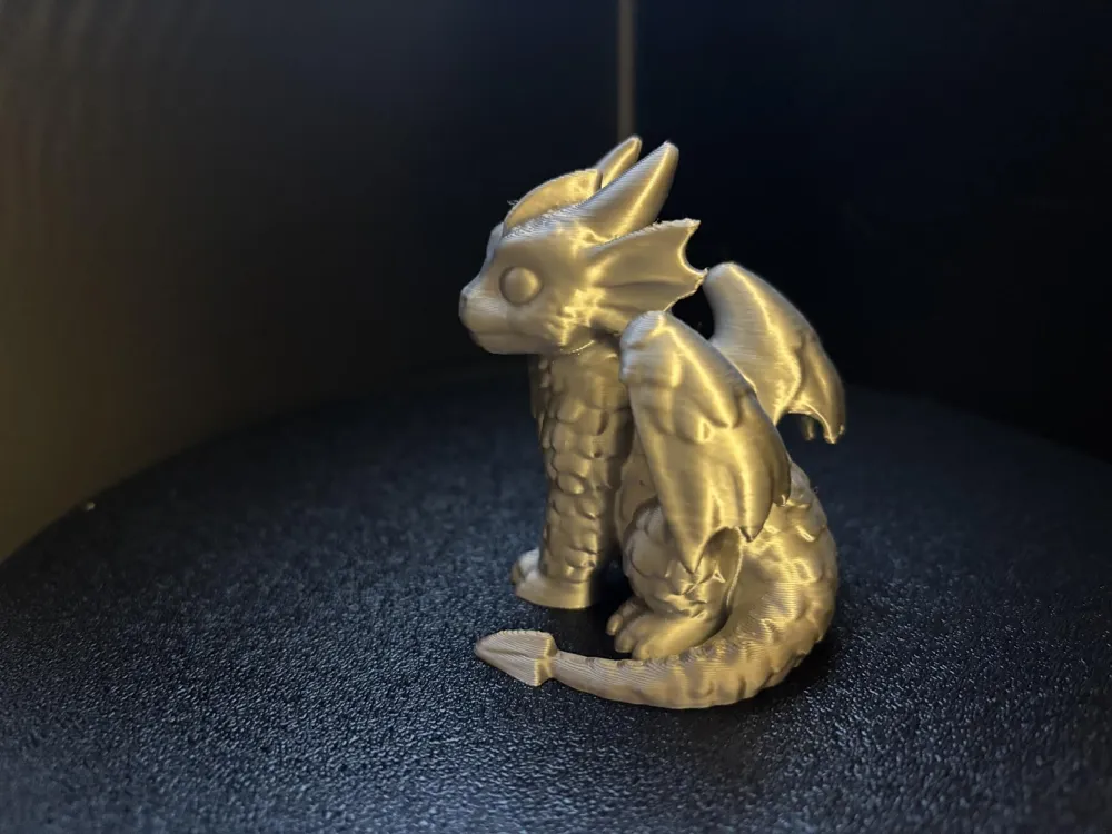 Scaled Dragon Sitting Toothless Inspired - Free 3D Print Model - MakerWorld