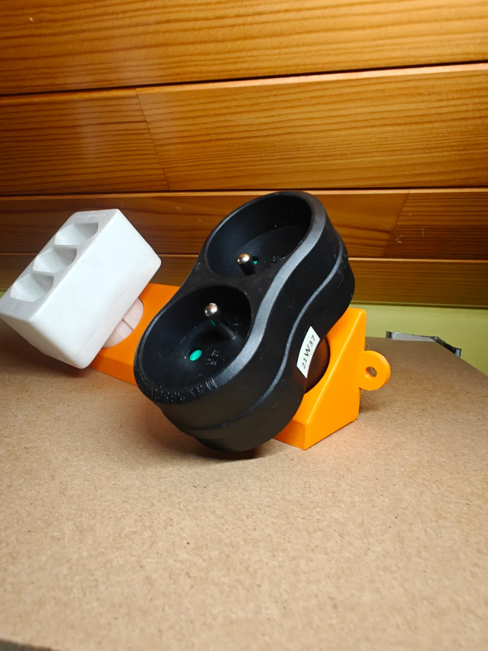 Wall-mounted power socket holder Remixed by Jochen_wxs - MakerWorld