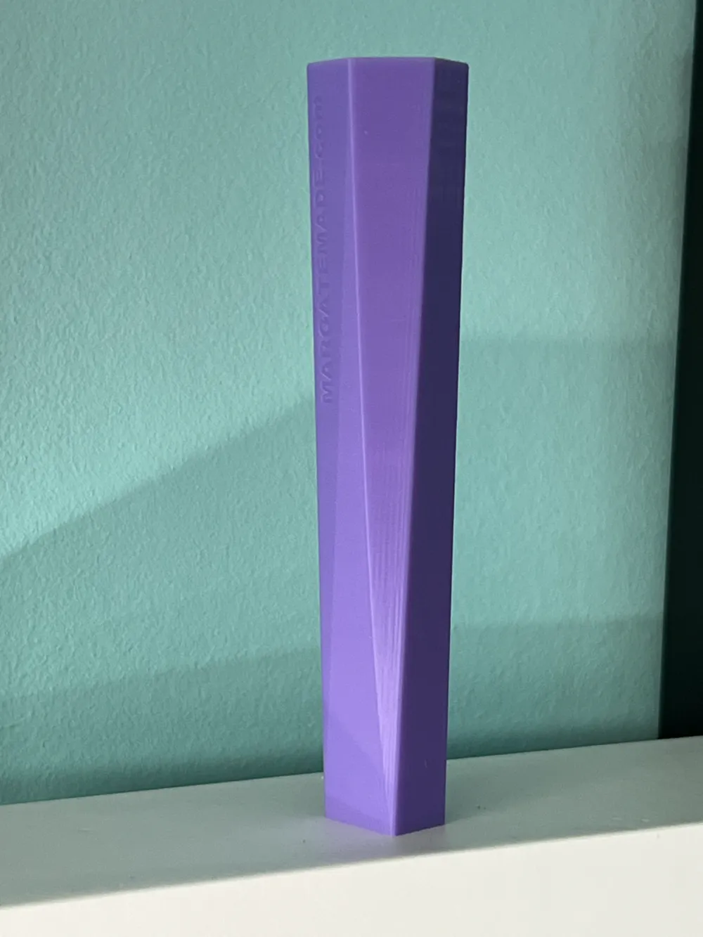 Mezuzah: an extruded scutoid with shin on side by paulsizemore - MakerWorld