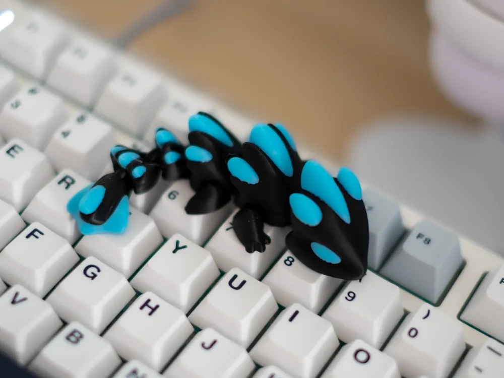 Mini Articulated Dragon 03 - Free 3D Print Model - MakerWorld