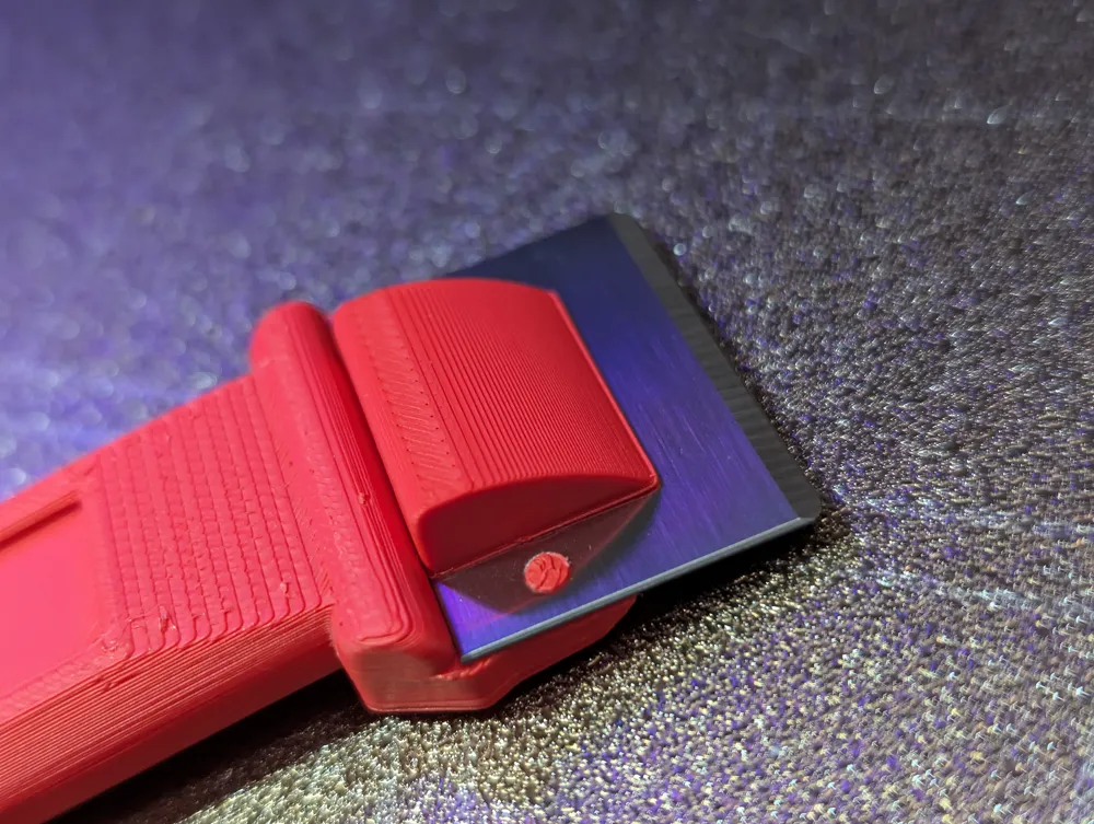 Bambu Scraper Clamp by Rymdskora - MakerWorld