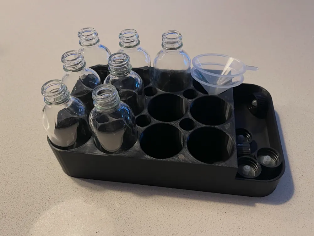 Small glass bottle storage container by Clownskull - MakerWorld