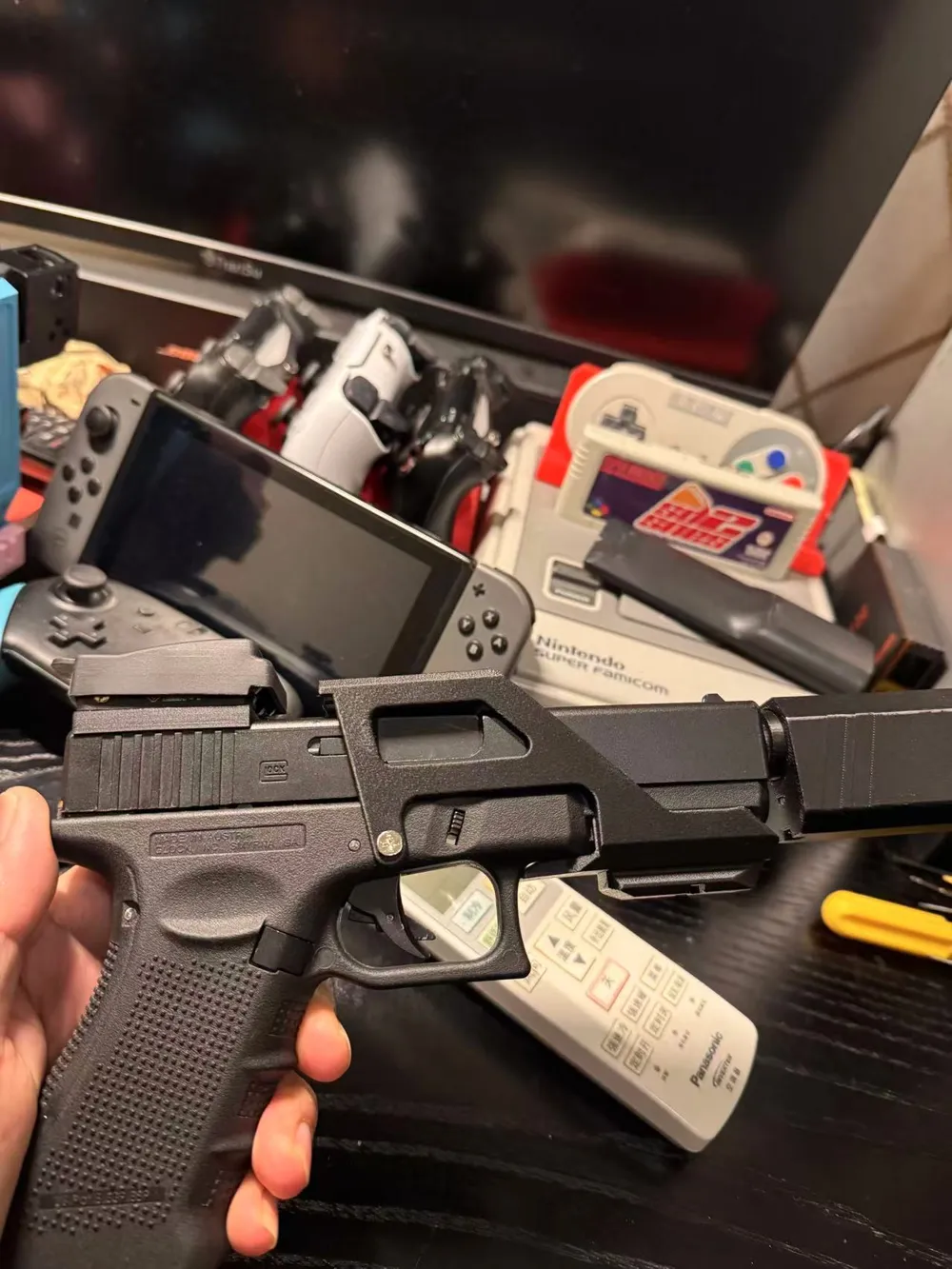 Adds RMR footprint optic support, toy Glock scope mount, C-More ...