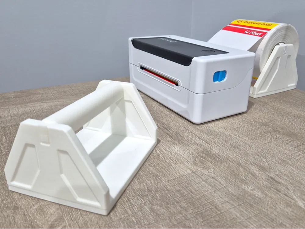 HERO PRINTER LABEL ROLL HOLDER (2 sizes) by Dean_Menhennet - MakerWorld