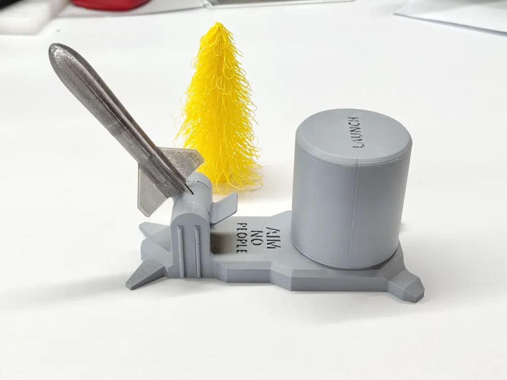 Xmas Tree Piston Launcher by Dr. J. Ma - MakerWorld