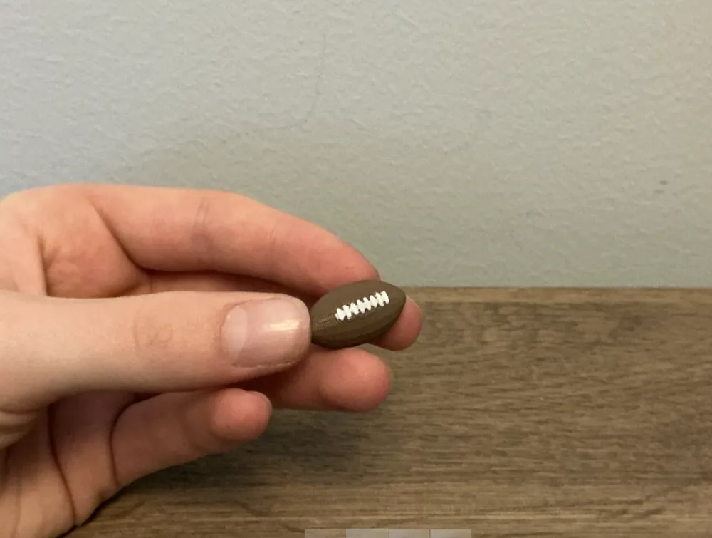 Worlds Smallest Football - Free 3D Print Model - MakerWorld