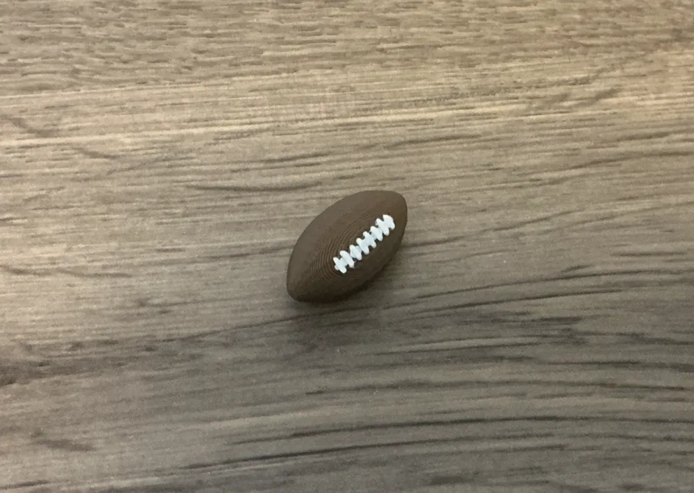 Worlds Smallest Football - Free 3D Print Model - MakerWorld